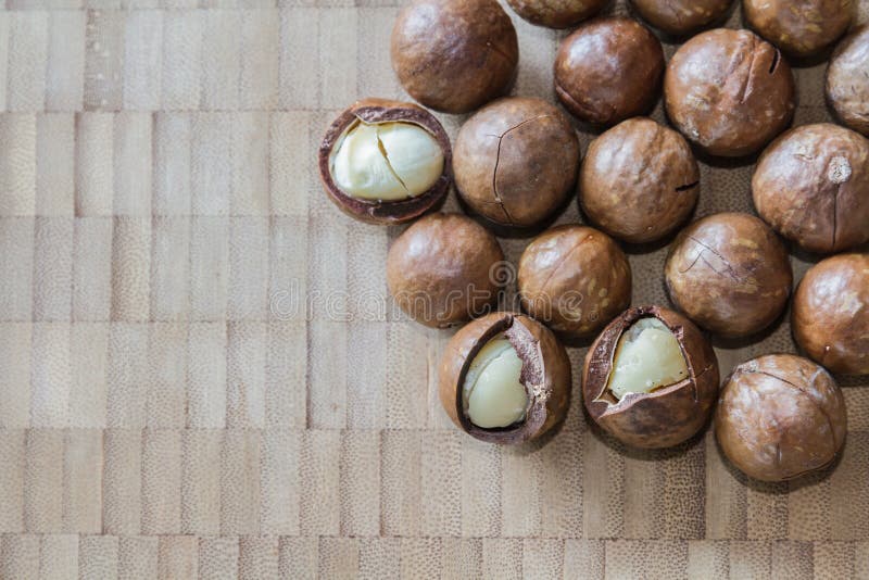 Macadamia on wood table. stock image. Image of macadamia - 49114695