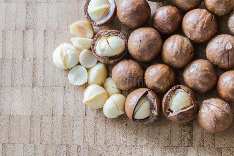 Macadamia on wood table. stock image. Image of healthy - 49114949