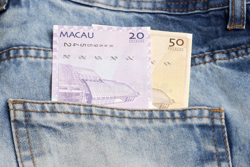 Macanese Pataca in the Pocket of Blue Jeans Stock Photo - Image of ...