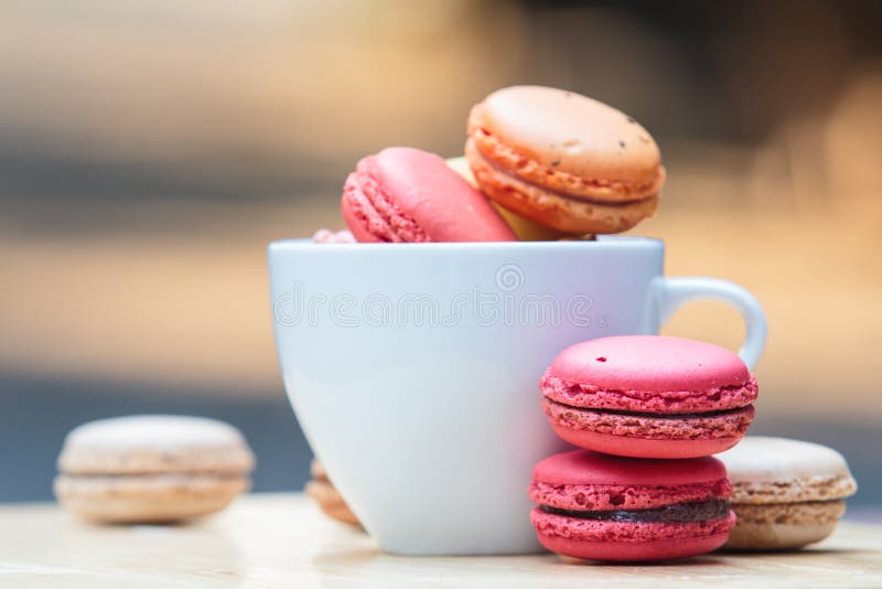 Macaron in coffee cup stock image. Image of flavor, biscuit - 37773385