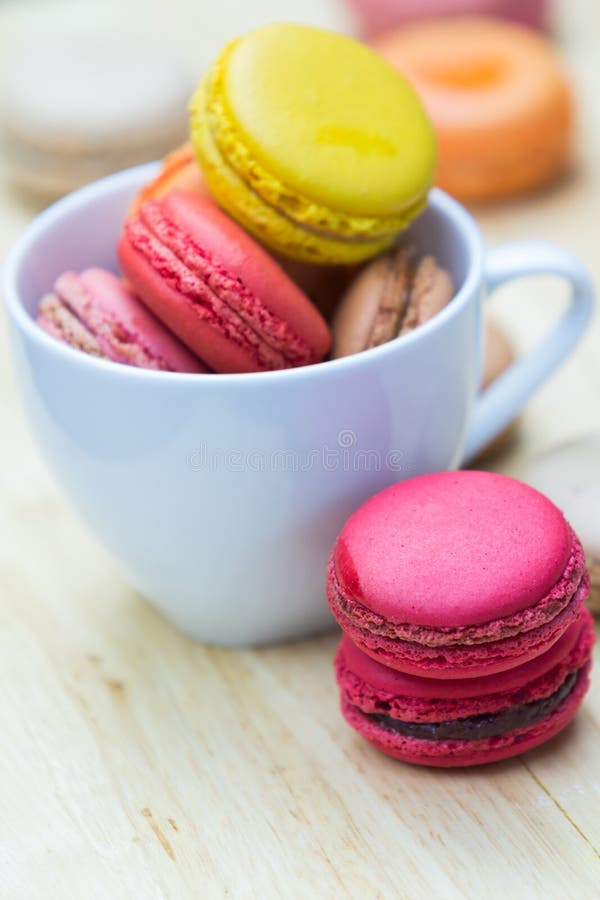 Macaron in coffee cup stock photo. Image of cuisine, french - 37773412