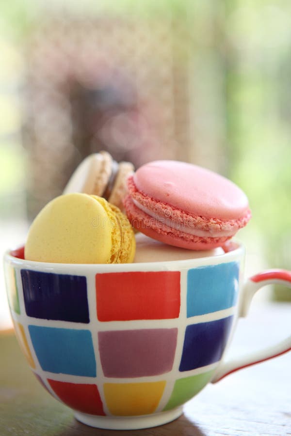 Macaron on cup stock photo. Image of macaroon, horizontal - 29902012