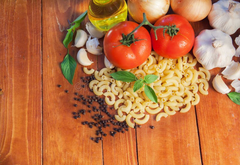 Macaroni Ingredients on Wood Stock Photo - Image of basil, spaghetti ...
