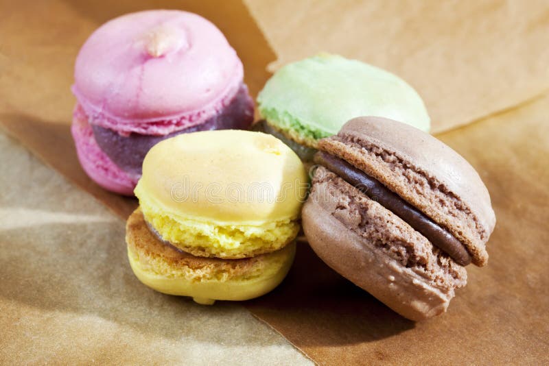 Macaroons on baking paper stock image. Image of macaroon - 50496489