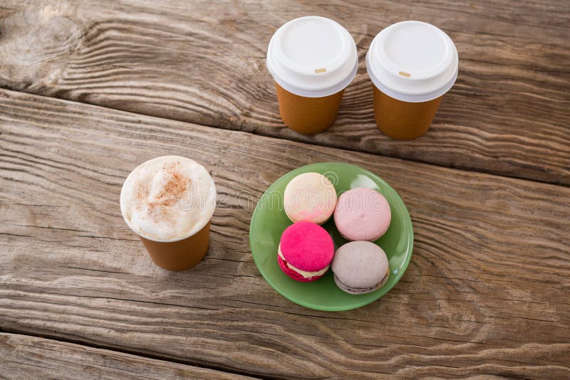 Macaroons with Coffee on Wooden Table Stock Image - Image of macaroon ...