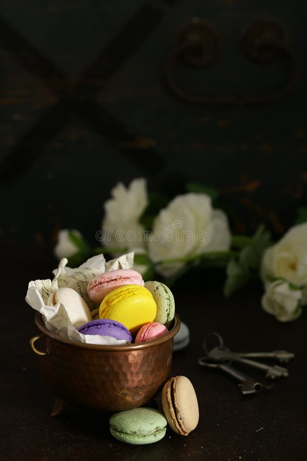 Macaroons in a copper cup stock image. Image of colourful - 165357005