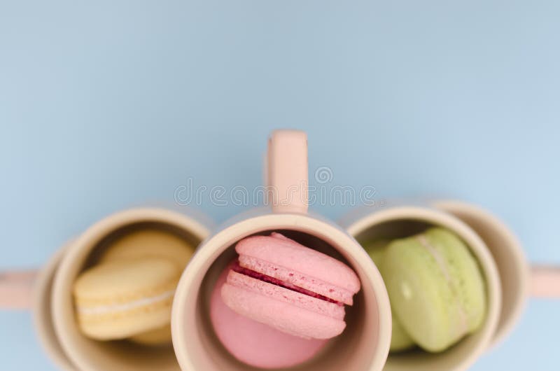 Macaroons in cups. stock photo. Image of blue, flavor - 126535752