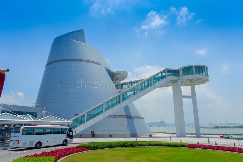 Macau Science Center, a Distinctive, Asymmetrical, Conical Shape ... Macau Science Center, a Distinctive, Asymmetrical, Conical Shape ...
