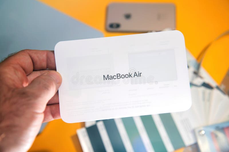 MacBook Air Quick Start Guide Held in Hand Editorial Stock Image ...