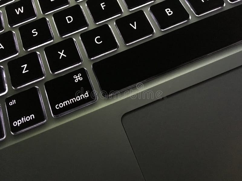 Macbook Keyboard Utilizing Backlit Keyboard Illumination. Editorial ...