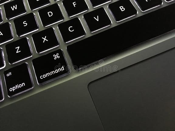 Macbook Keyboard Utilizing Backlit Keyboard Illumination. Editorial ...