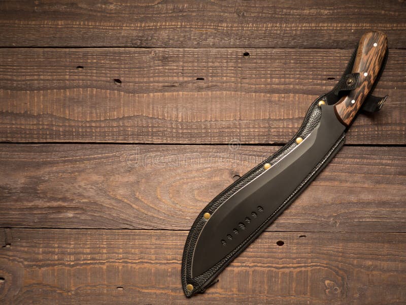 Machete on a wooden table stock image. Image of iron - 106066777