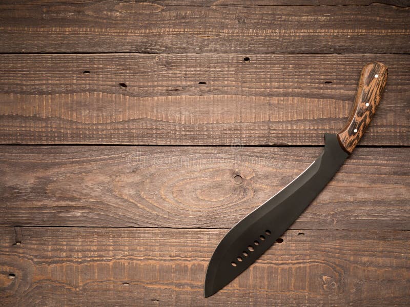 Machete on a wooden table stock image. Image of iron - 106066777