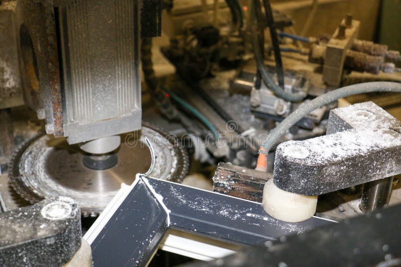 A Machine Adjusts a PVC Window Frame in a Carpentry Stock Image - Image ...