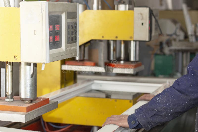 Machine Assembly of Plastic Window Frames at the Factory Manufacture of ...