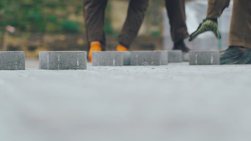 The Machine Automatically Installs the Main Part Gray Paving. Stock ...