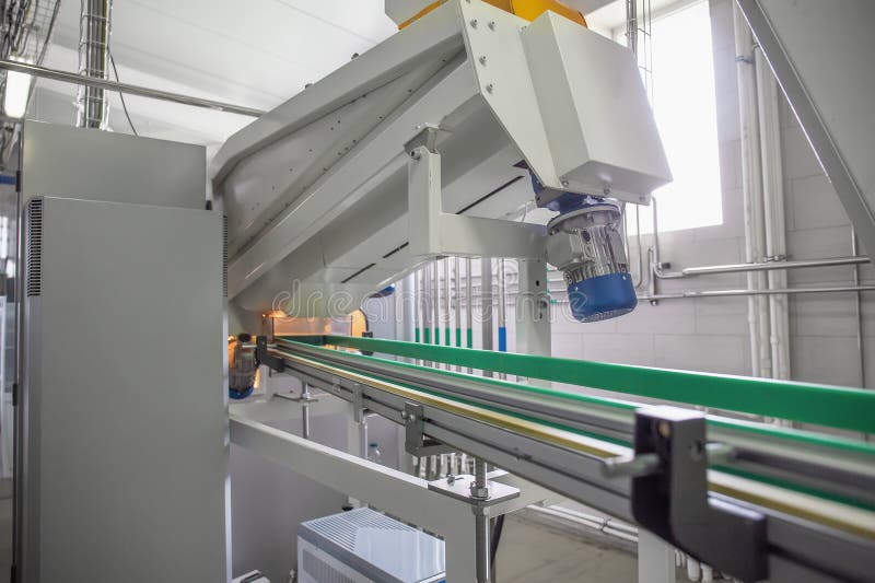 Conveyor with Preforms for Production of Bottles Stock Image - Image of ...
