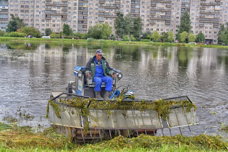 Machine for Cleaning the Pond of Debris and Algae Editorial Stock Photo ...