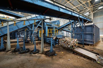 Machine for Compacting Household Waste. Compaction of Garbage into ...