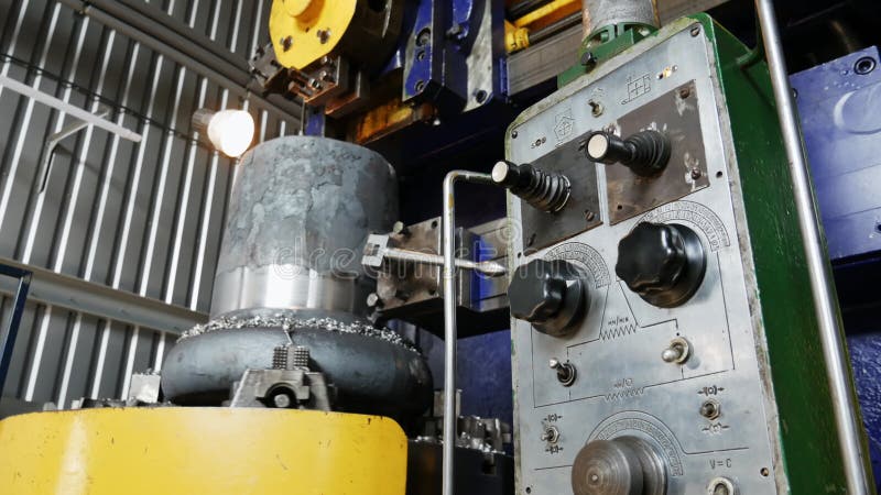 Machine Control Panel and Metal Cylindrical Part on a Lathe with a Tool ...