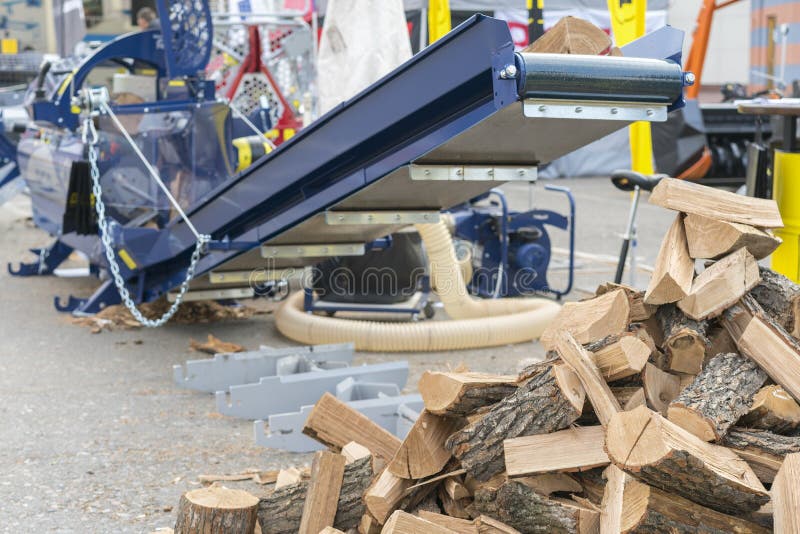 Machine for Cutting Firewood. Chopping Firewood with a Machine Close Up ...