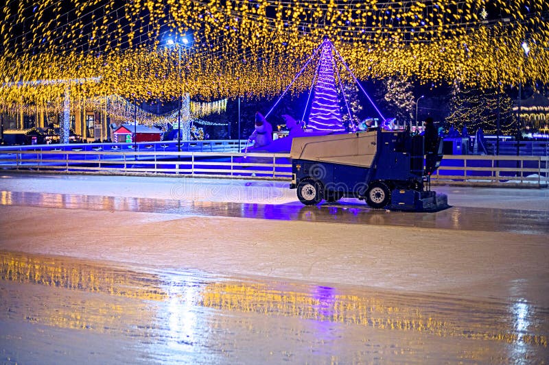 Machine on a Festive Figure Skating Rink Polishes the Stock Photo ...