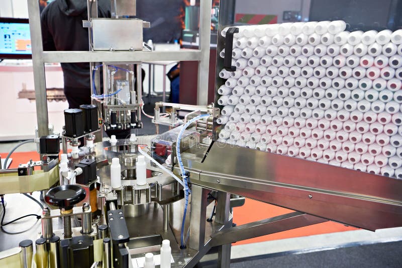 Machine for Filling Liquids into Plastic Tubes Stock Photo - Image of ...