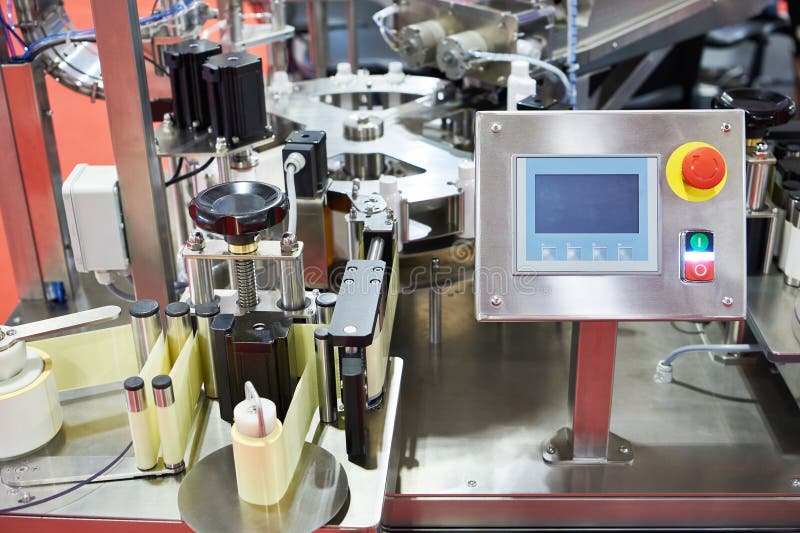 Machine for Filling Liquids into Plastic Tubes Stock Photo - Image of ...