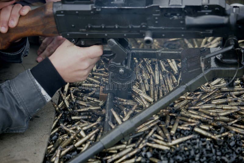 Machine-gun in action stock image. Image of automatic - 3706599