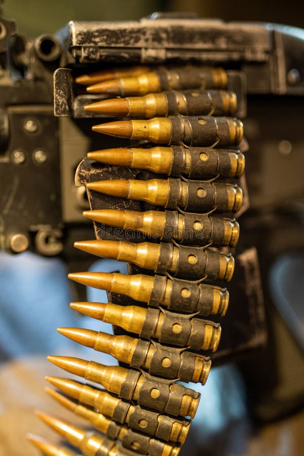 Machine gun bullets stock image. Image of belt, copper - 381224711