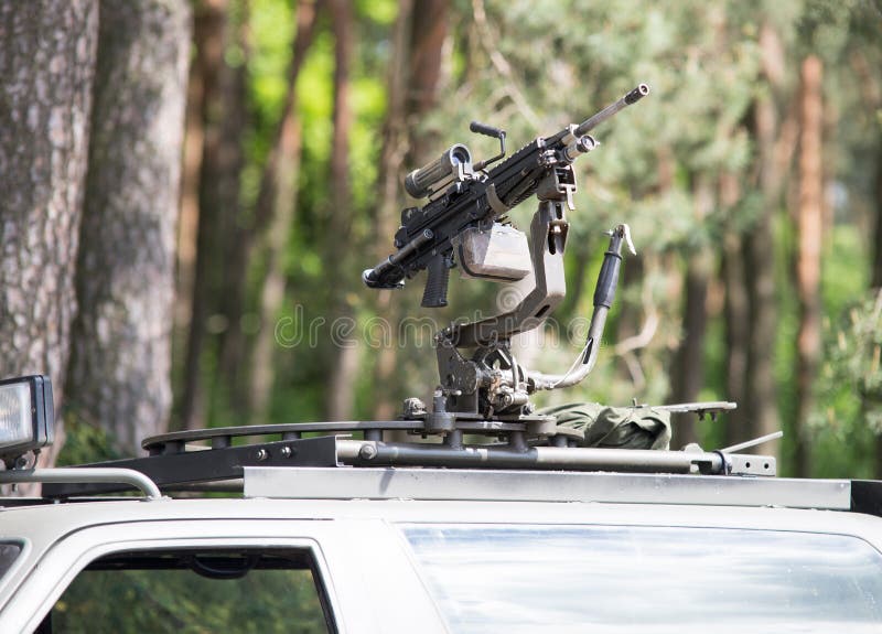 Machine Gun in the Roof of Car Stock Photo - Image of weapon, marines ...