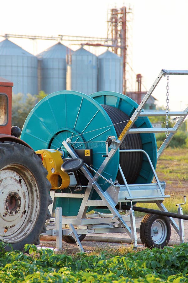 Hose Reel Irrigator on the Field Stock Photo - Image of potato, machine ...