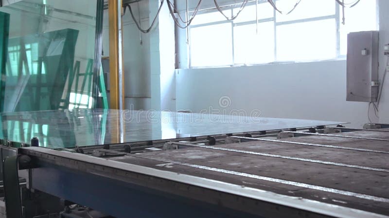 Machine is Laying Down Large Sheets of Glass. Full HD Stock Footage ...
