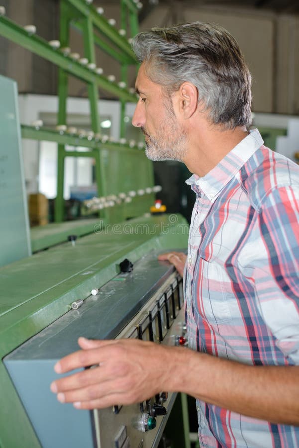 Machine Operator at Factory Stock Image - Image of industry, metal ...