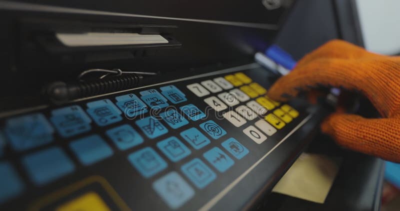 The Machine Operator Presses the Buttons of the CNC Machine. Injection ...