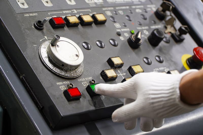 Machine Operator Presses the Green Start Button on the CNC Machine S ...