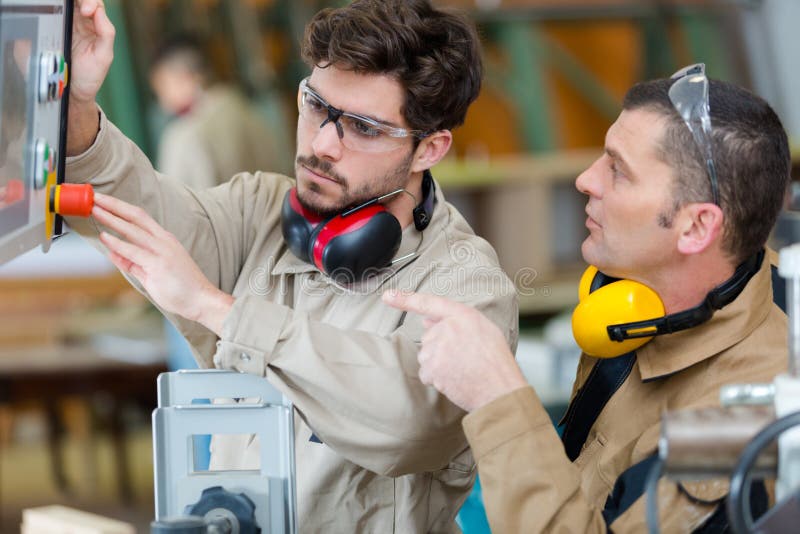 Machine Operator in Production Plant Stock Image - Image of press ...