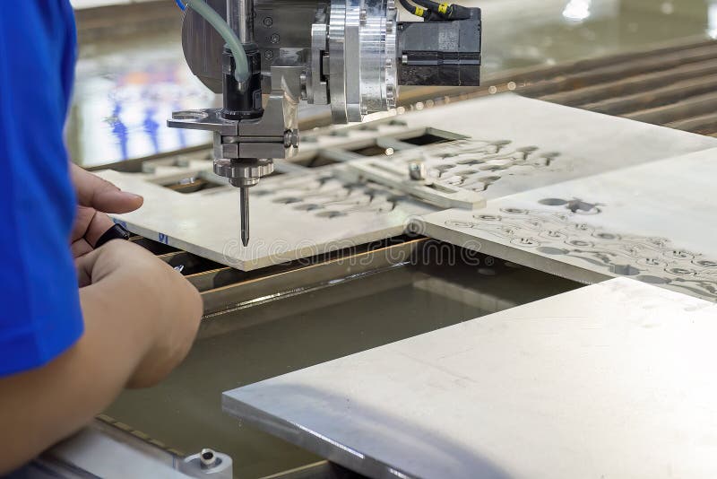 Machine Operator Setup the Multi-axis Abrasive Waterjet Cutting Machine ...