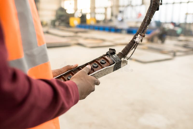 Machine Operator Using Control Panel Stock Photo - Image of vest ...