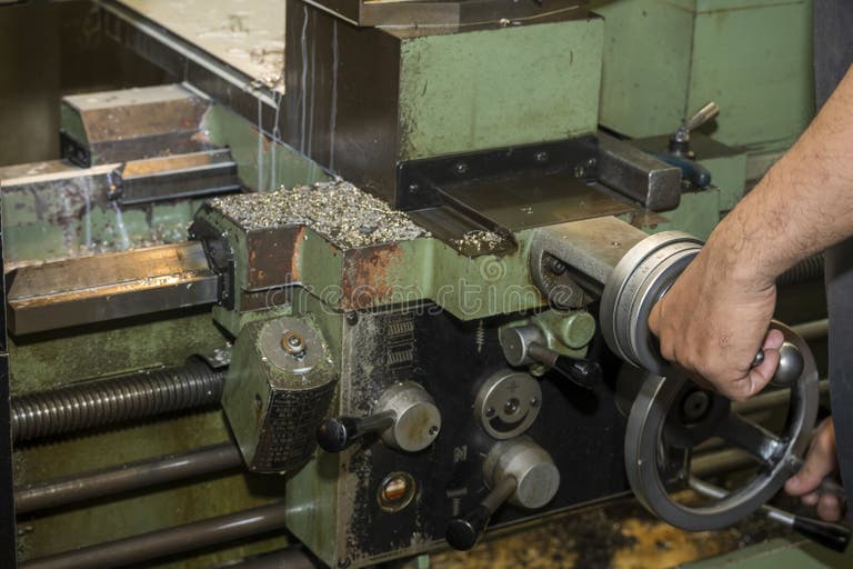 The Machine Operator Working with Lathe Machine Stock Photo - Image of floor, material: 328206438