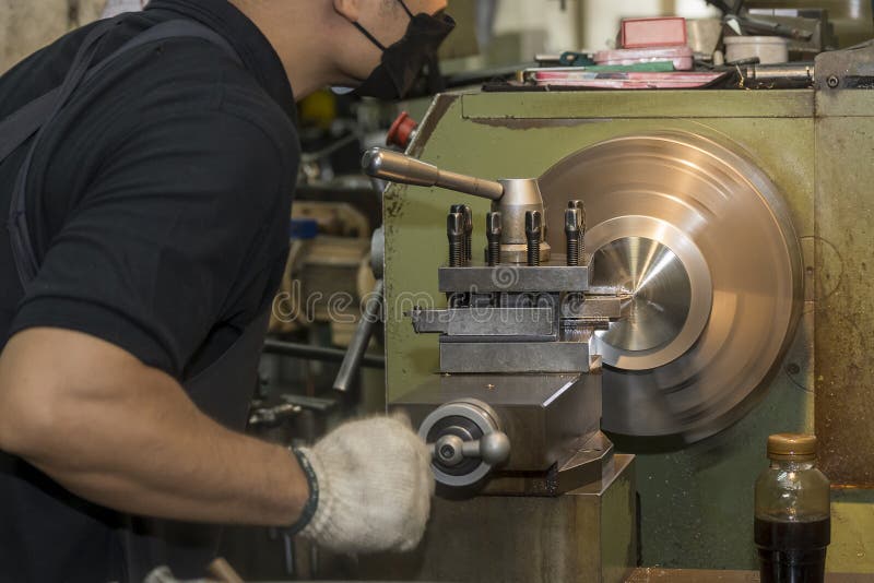The Machine Operator Working with Lathe Machine Stock Photo - Image of ... The Machine Operator Working with Lathe Machine Stock Photo - Image of ...