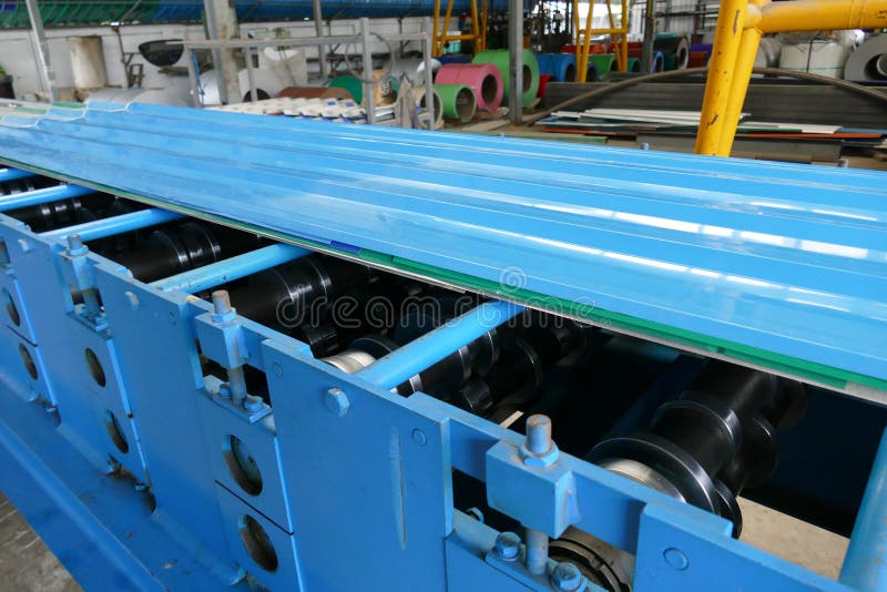The Machine for Producing Metal Sheet in the Factory Stock Photo ...