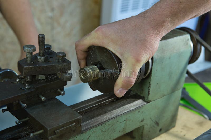 Working on a Lathe. the Machine is Ready for Work. the Wizard Checks ...