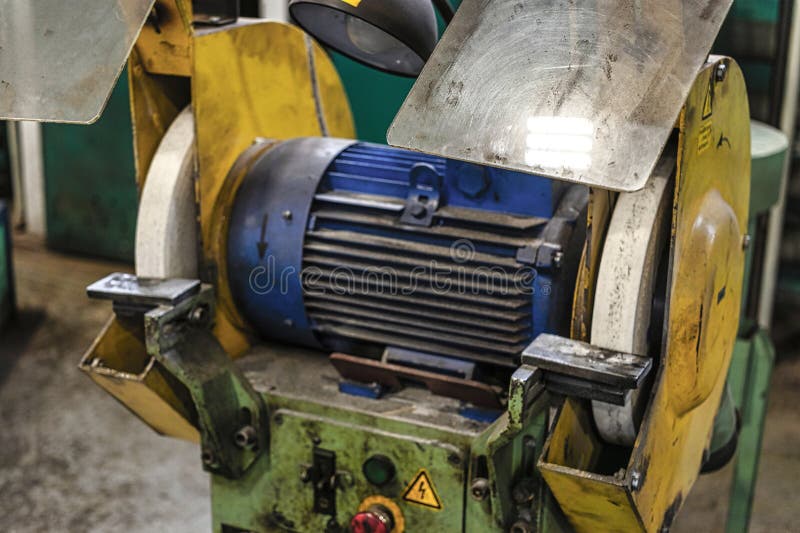 Machine Sanding with Grinding Wheels for Metalwork Stock Photo - Image ...