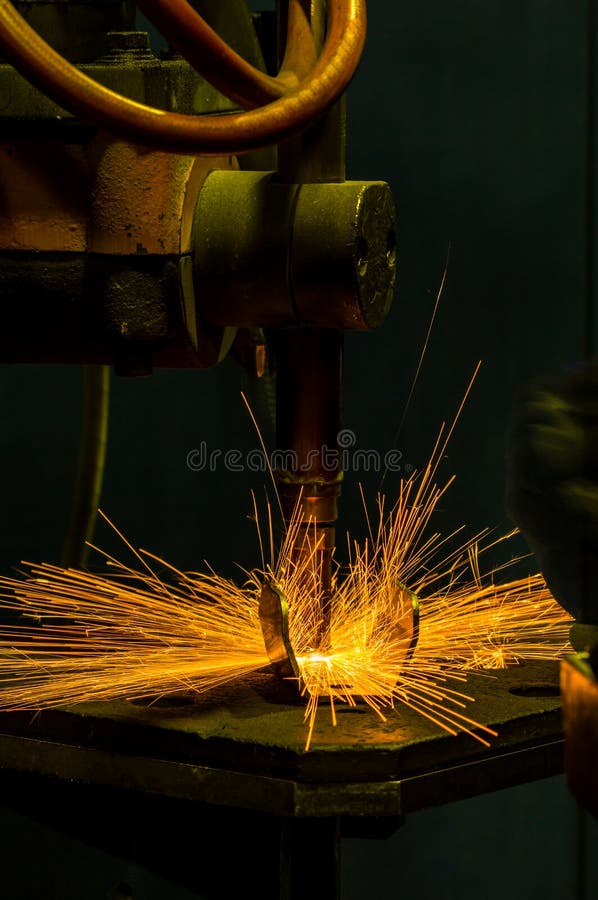 Machine Spot nut stock photo. Image of flame, automation - 65273200