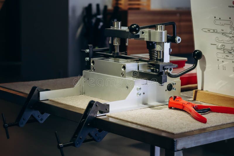Machine and Tools for Assembling Swiss Knives Editorial Stock Image ...
