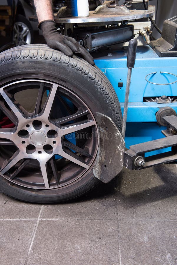 Machine for the Tyre Change in a Car Repair Stock Image - Image of ...
