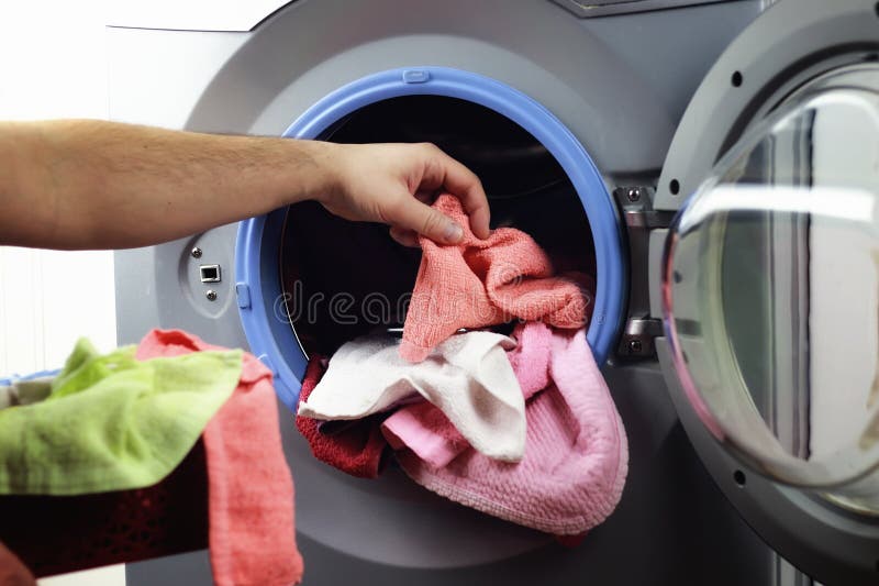 Machine Washer hand put stock photo. Image of housework - 90022488