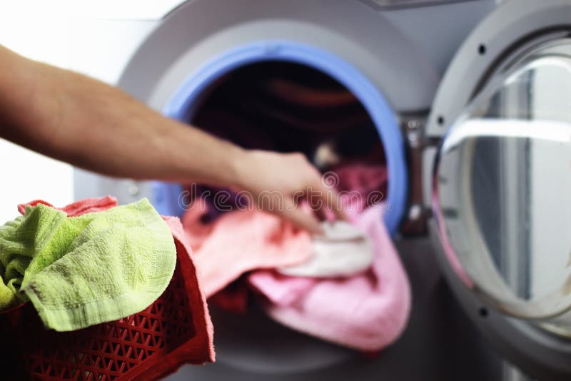 Machine Washer hand put stock photo. Image of background - 80350392