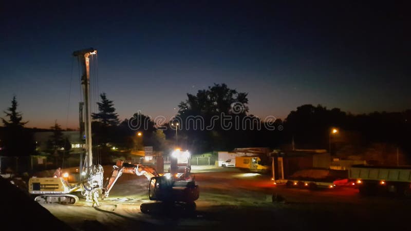 Construction site at night stock footage. Video of city - 293505688